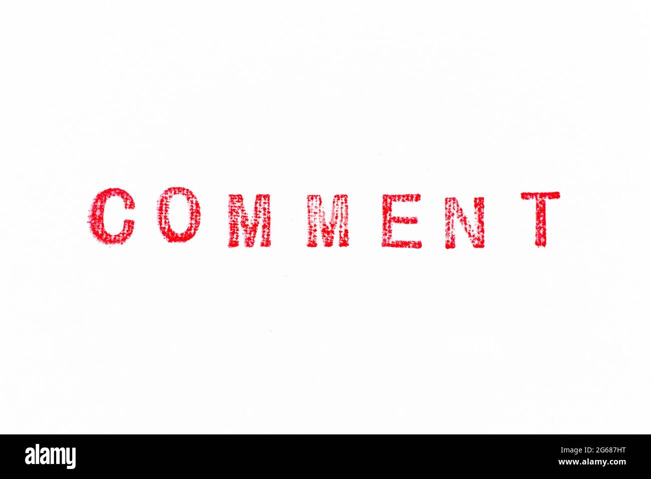 Red color rubber stamp in word comment on white paper background Stock ...