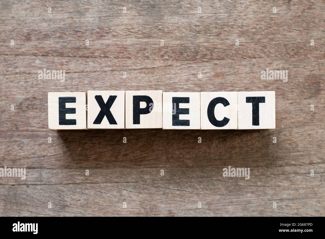 Alphabet letter block in word expect on wood background Stock Photo - Alamy