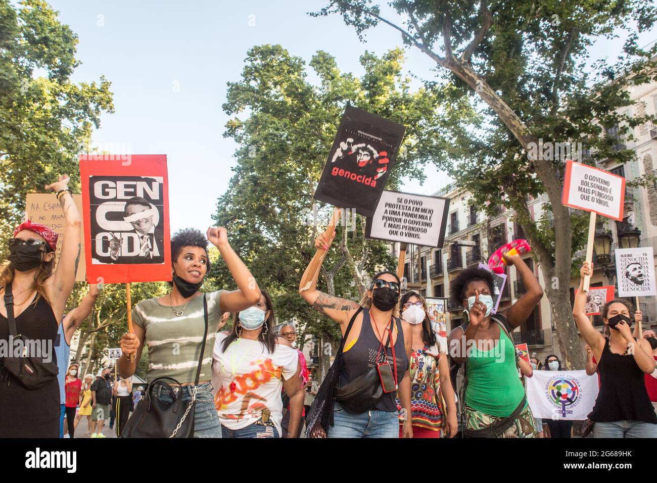 Barcelona, Spain. 03rd July, 2021. Protesters holding placards while ...