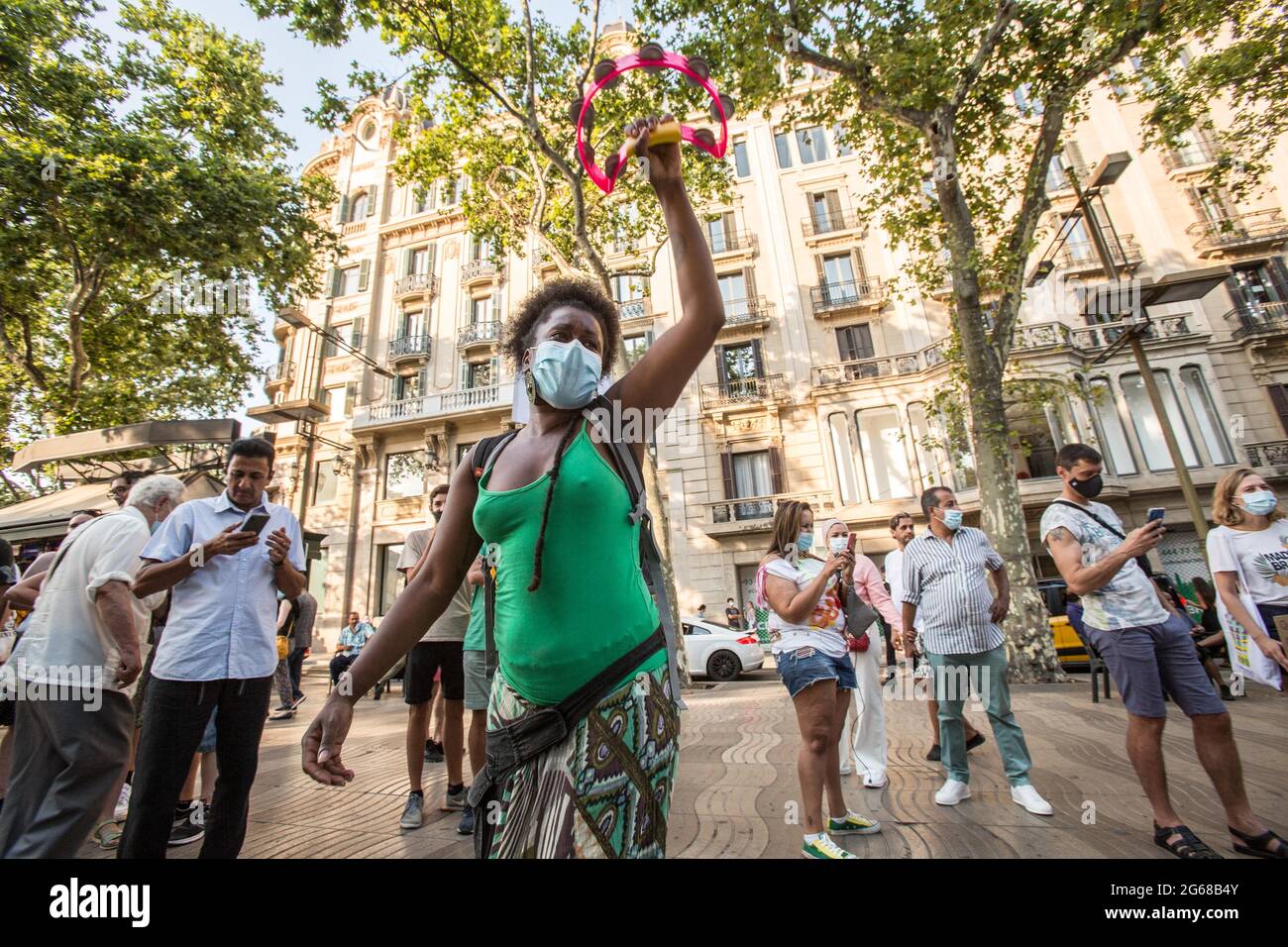 Barcelona, Spain. 03rd July, 2021. A protester seen playing musical ...