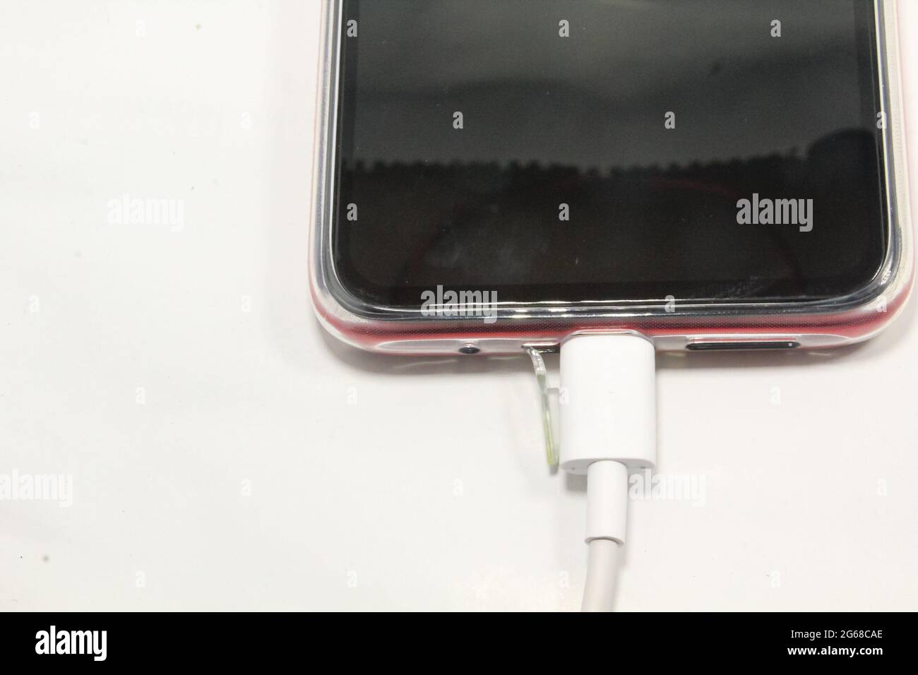 Smartphone charging cable attached on smartphone point, new smartphone ...