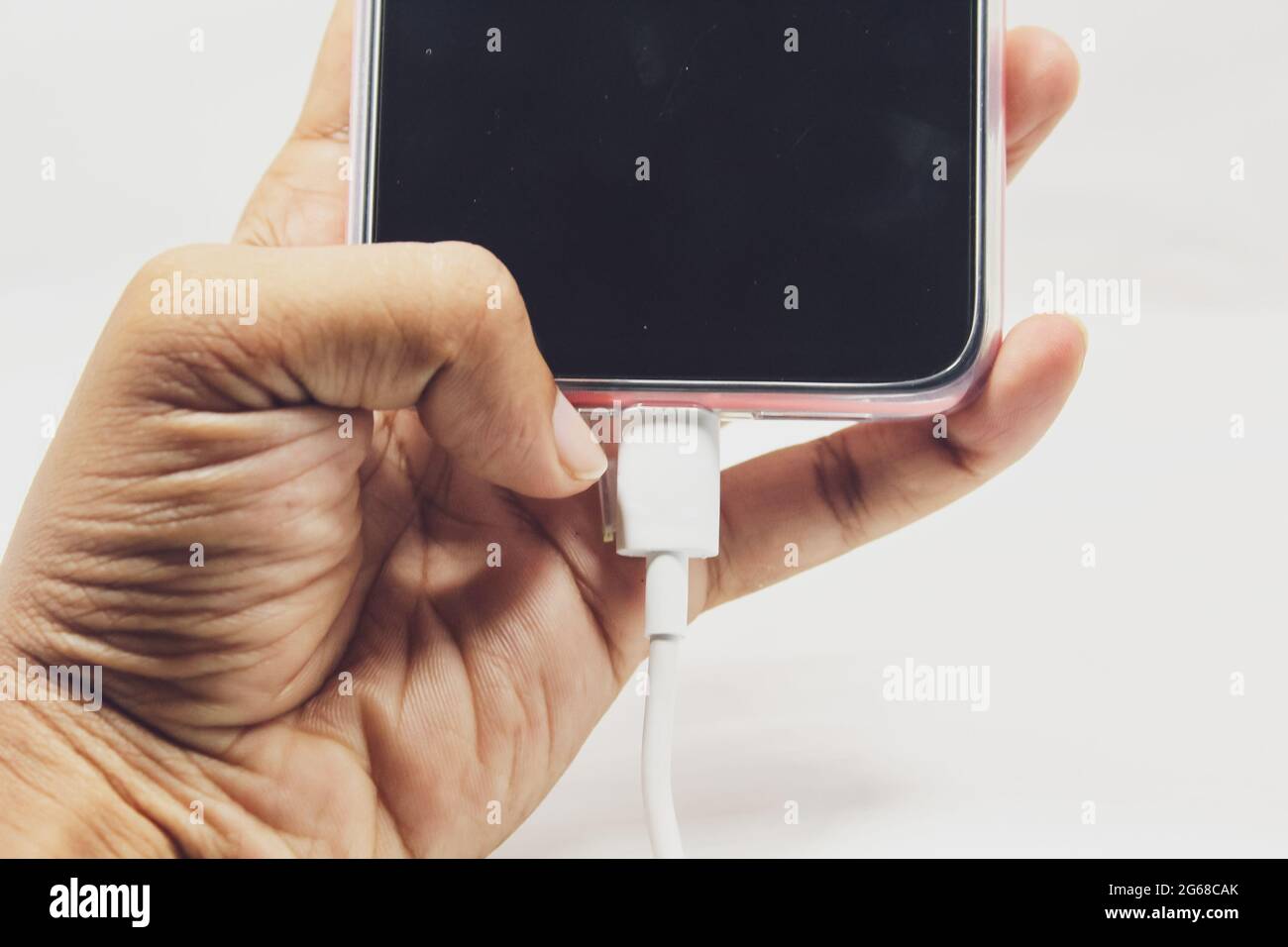 Smartphone charging cable attached on smartphone point, new smartphone ...