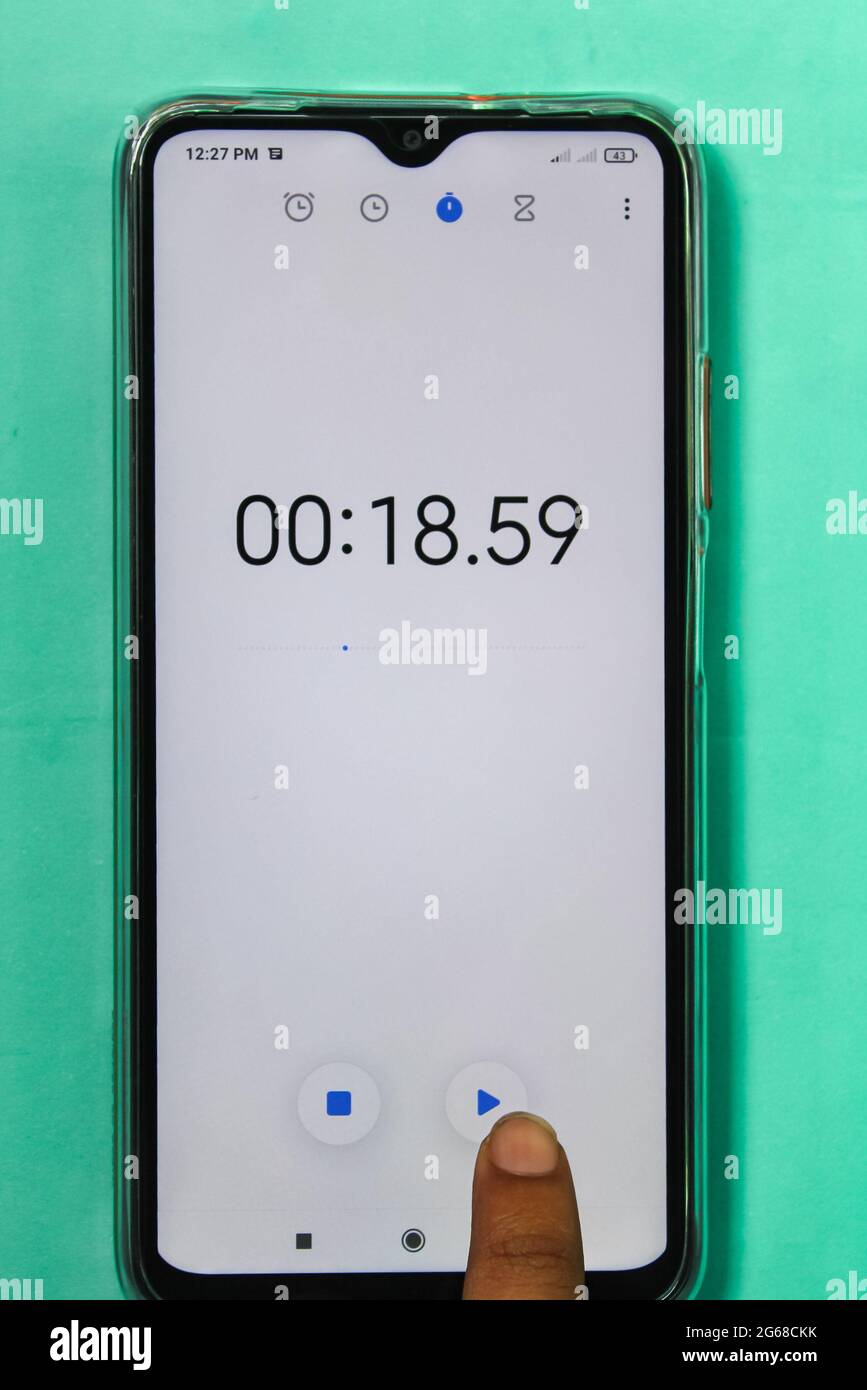 Mobile phone alarm clock hi-res stock photography and images - Alamy