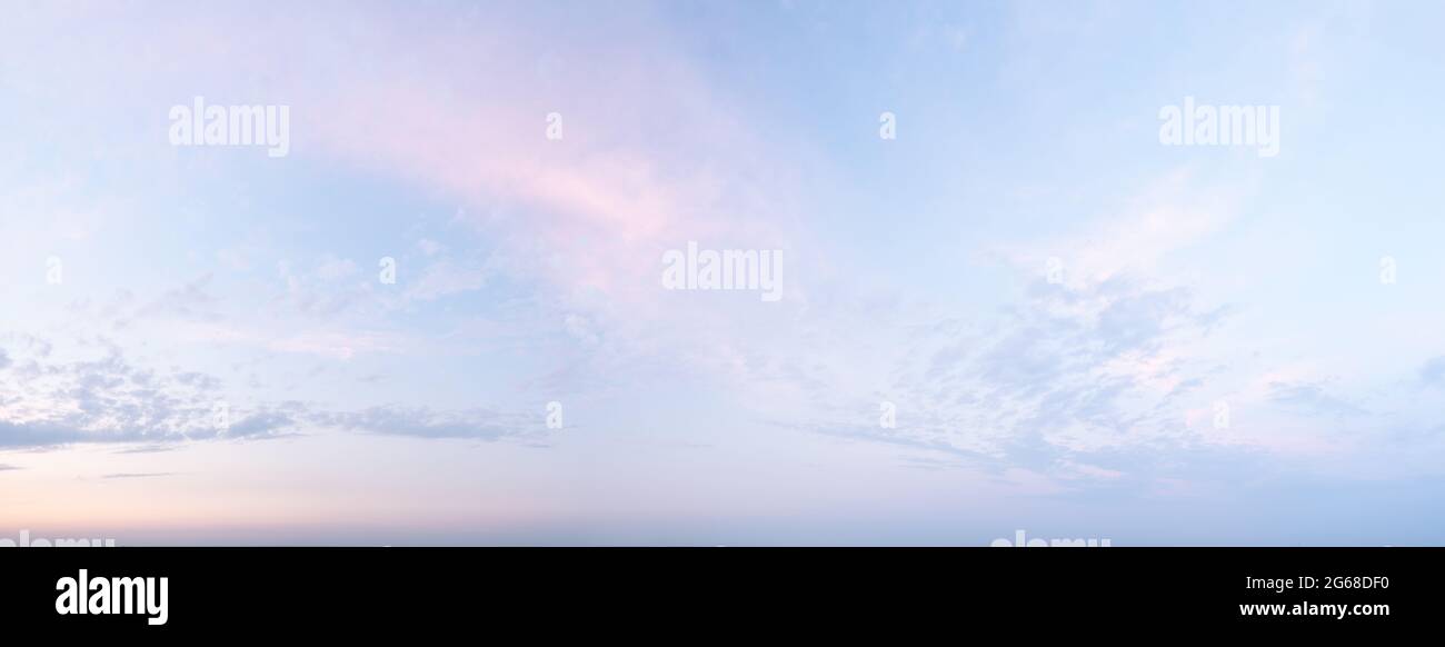 The azure cloud in the clear blue sky before sunset is a panoramic ...