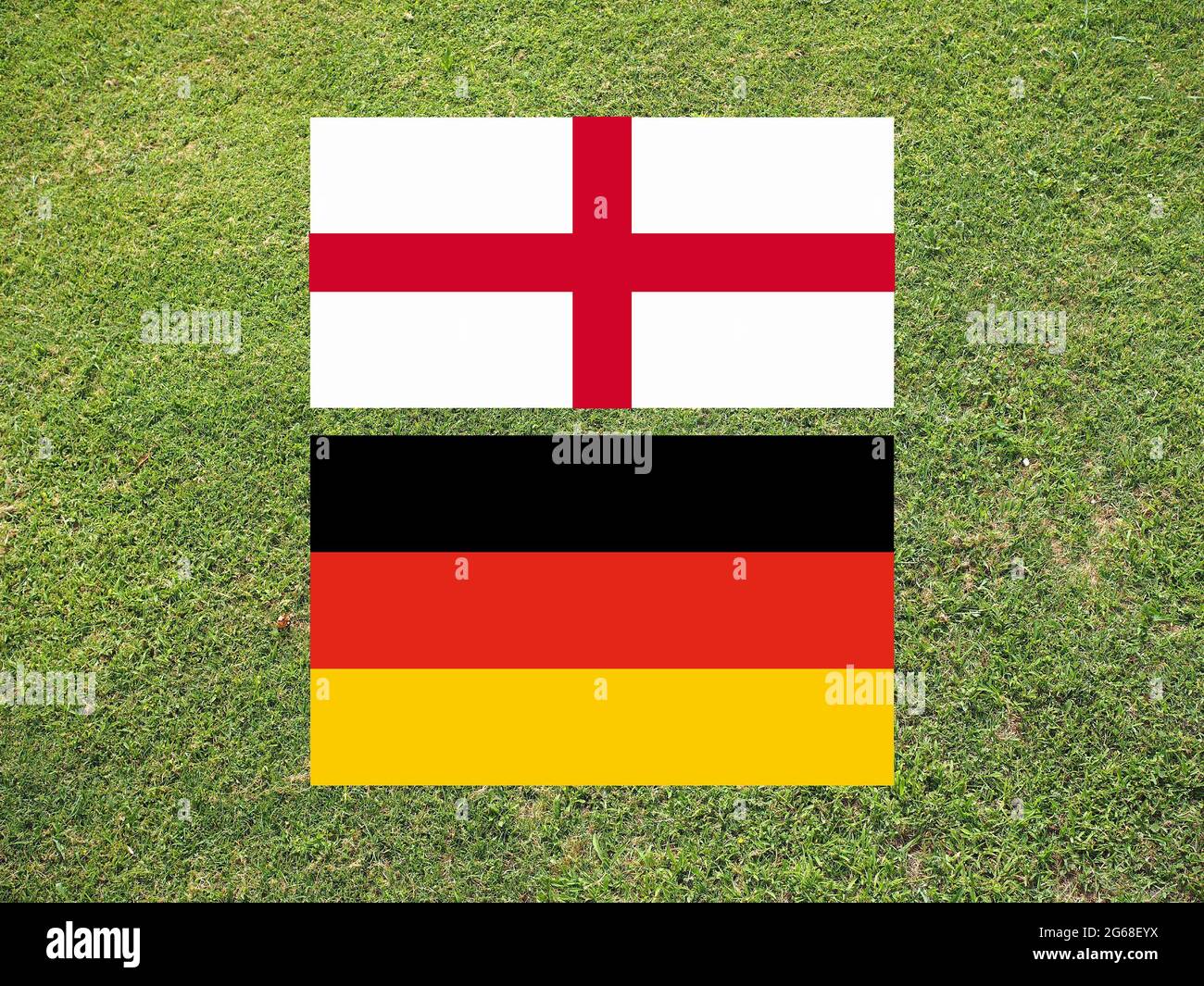 Flags of England and Germany over football field grass Stock Photo - Alamy