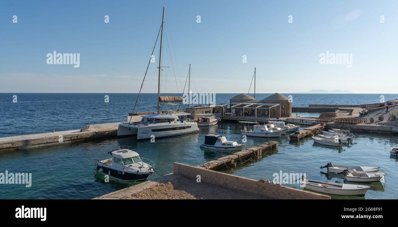 A view of a tiny port for small ships and sea yachts Stock Photo - Alamy
