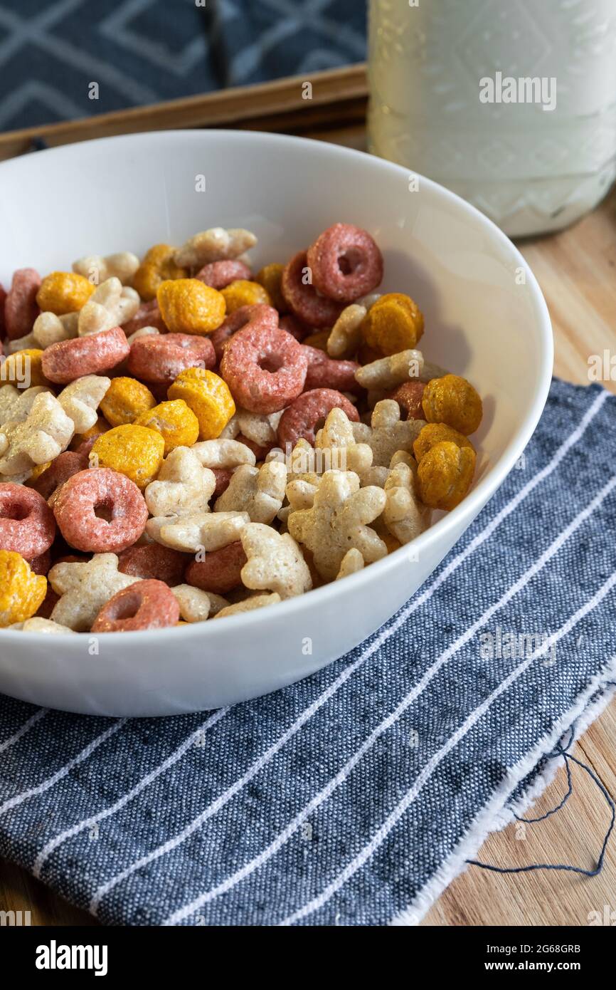 Colored cereals in a white bowl Stock Photo - Alamy