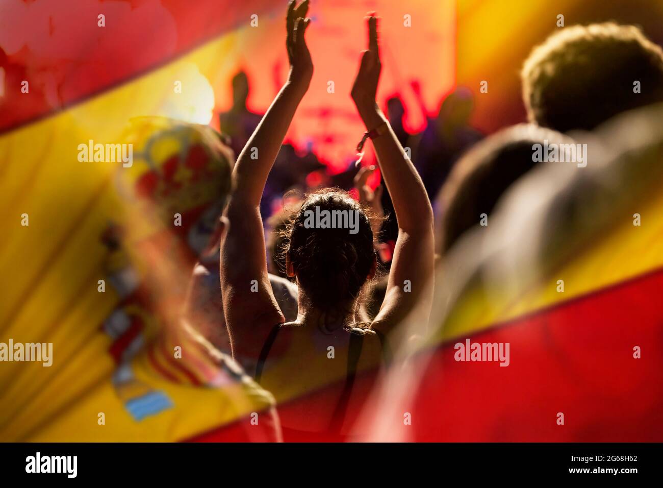 Football fans supporting Spain - crowd celebrating in stadium with ...