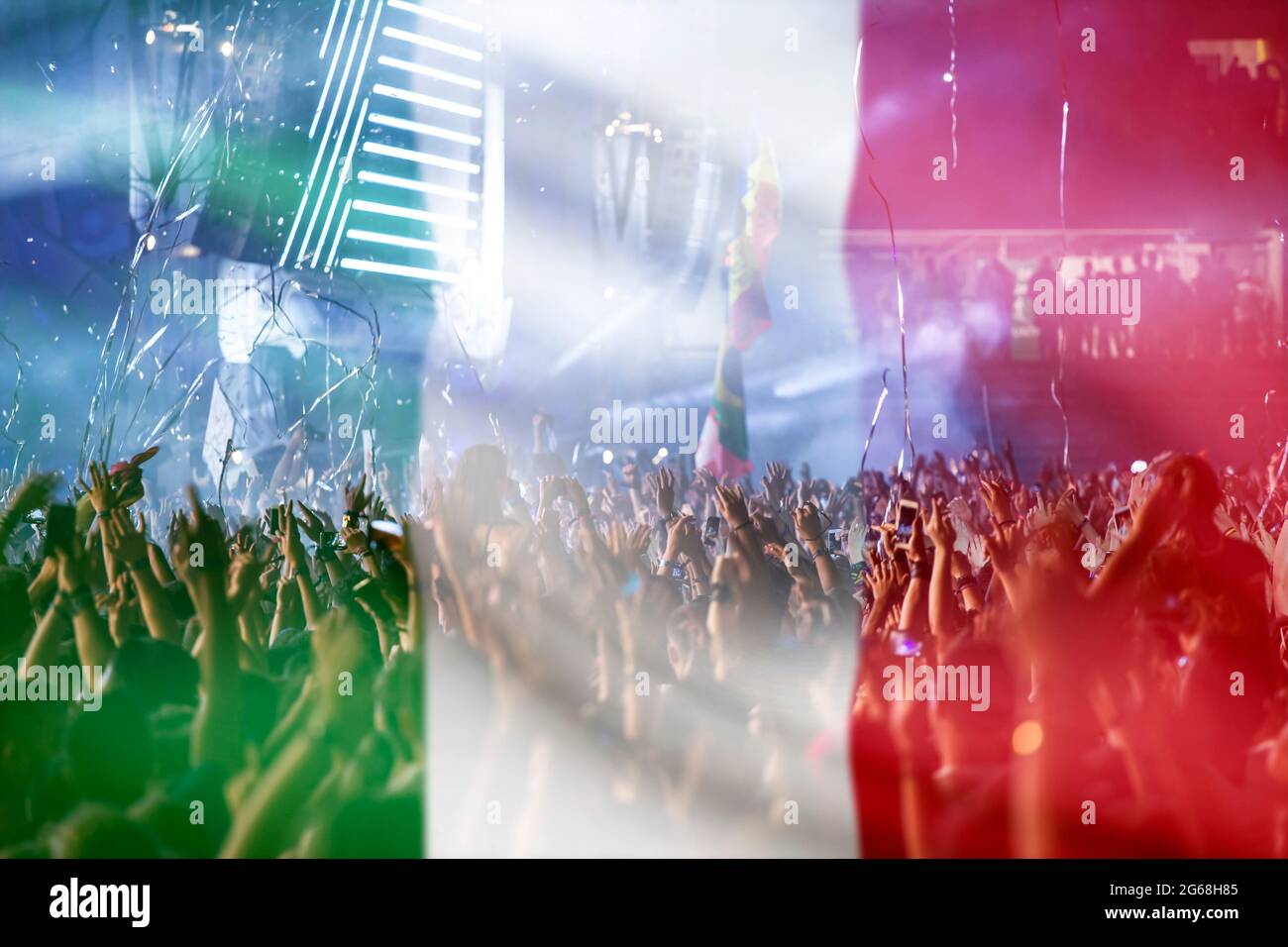 Soccer fans supporting Italy - crowd celebrating in stadium with raised ...