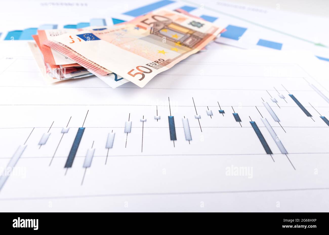 Stock market graph with bank notes Stock Photo - Alamy