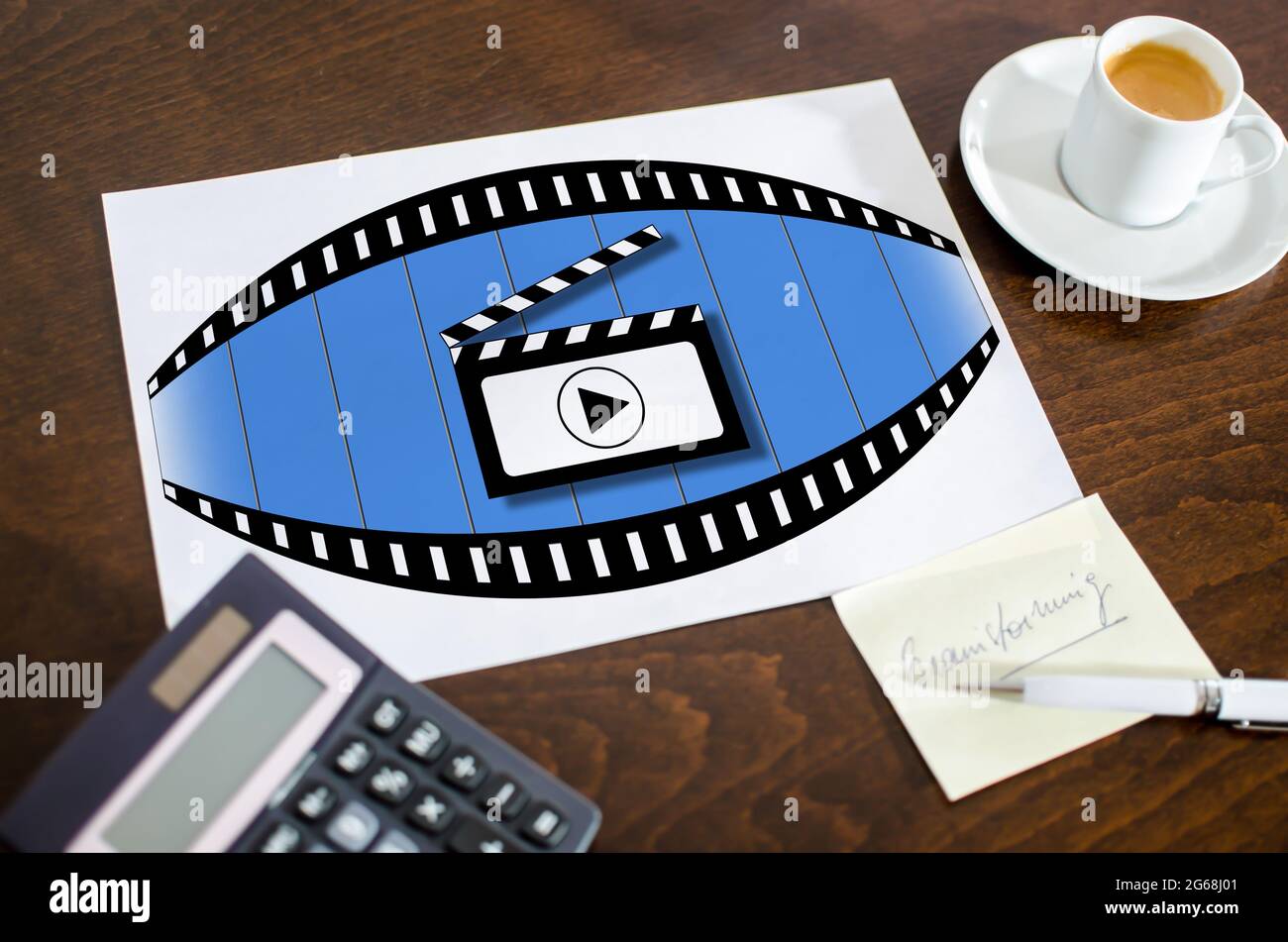 Cinema concept on a paper placed on a desk Stock Photo - Alamy