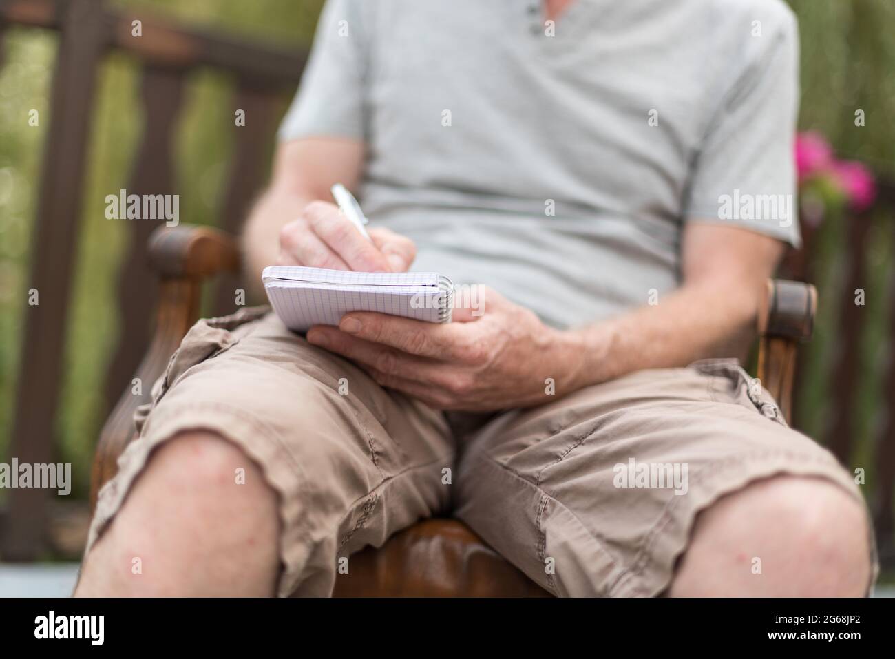 Man write book outdoor hi-res stock photography and images - Alamy