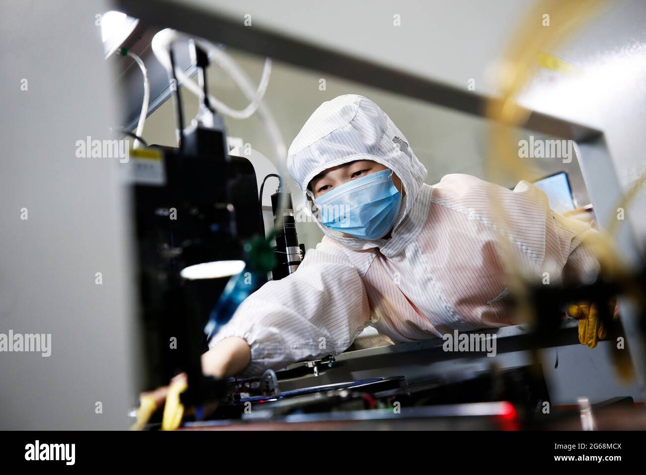 SUQIAN, CHINA - JULY 4, 2021 - A worker works in the workshop of a chip manufacturing enterprise ...