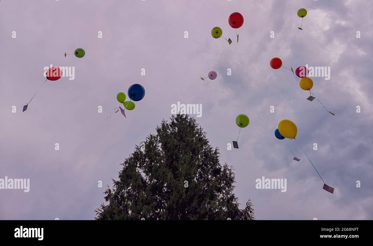 Balloons with names and intents written and released to the sky Stock ...