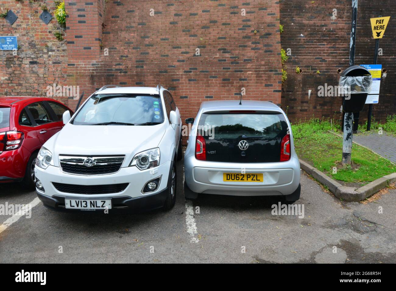 A poor parked small car in a town in England Stock Photo - Alamy