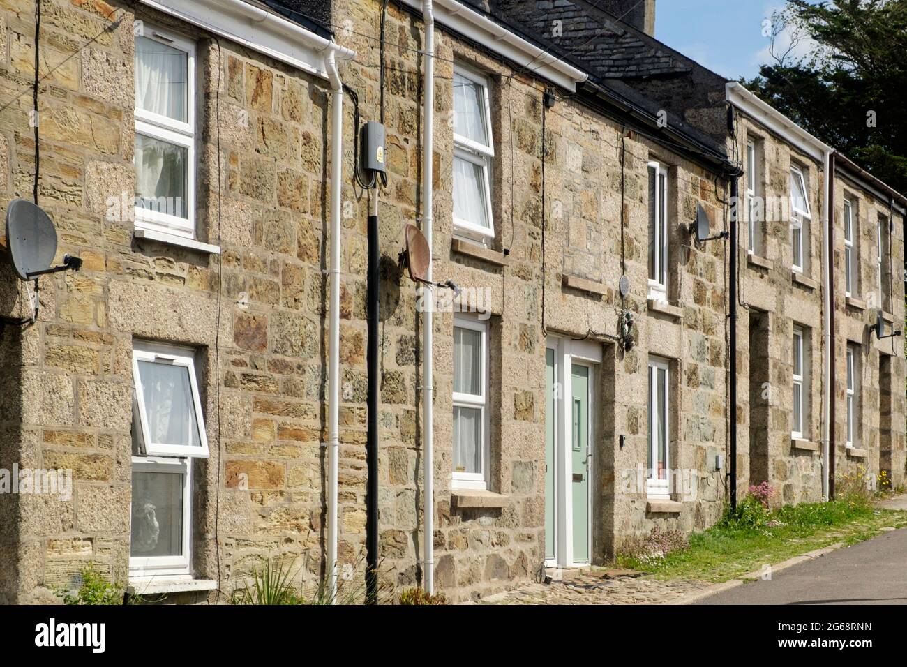 Around Helston, a small Cornish town. Traditional granite cottages on ...