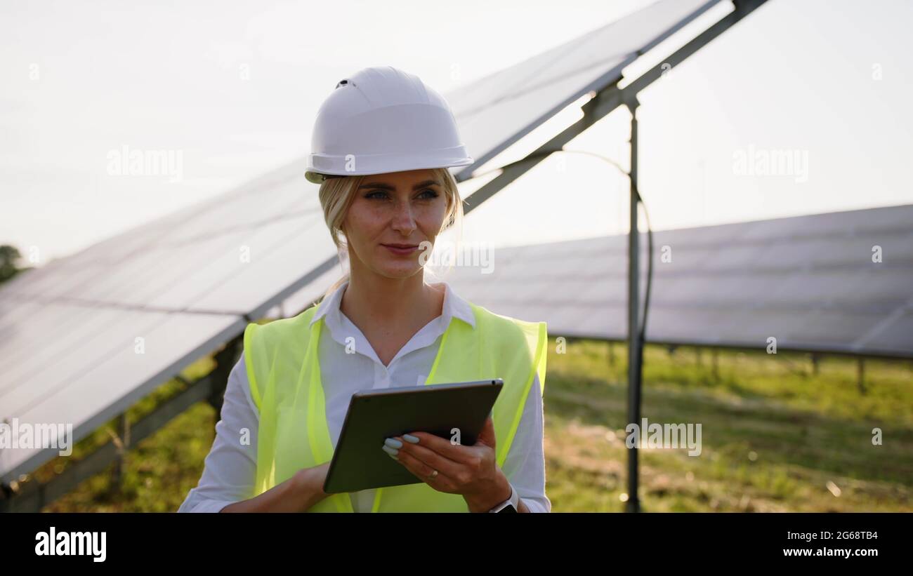 Inspector Engineer Woman Holding Digital Tablet Working in Solar Panels ...
