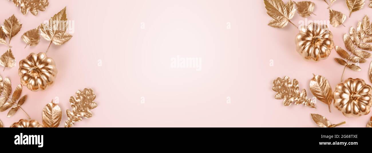 Gold autumn leaves on pink background. Autumn concept. Top view of ...