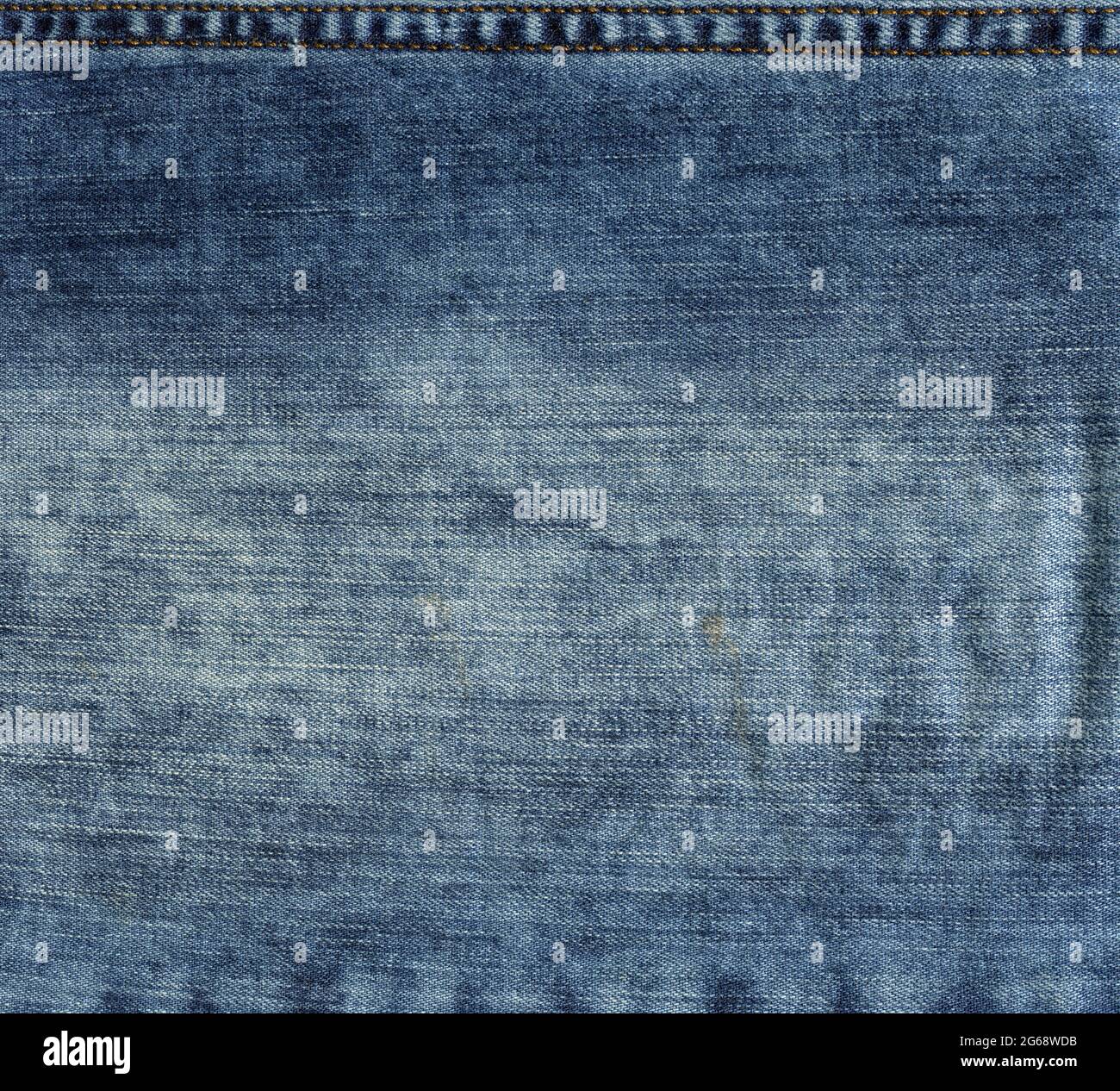 Seam blue denim cotton jeans fabric texture background and wallpaper ...