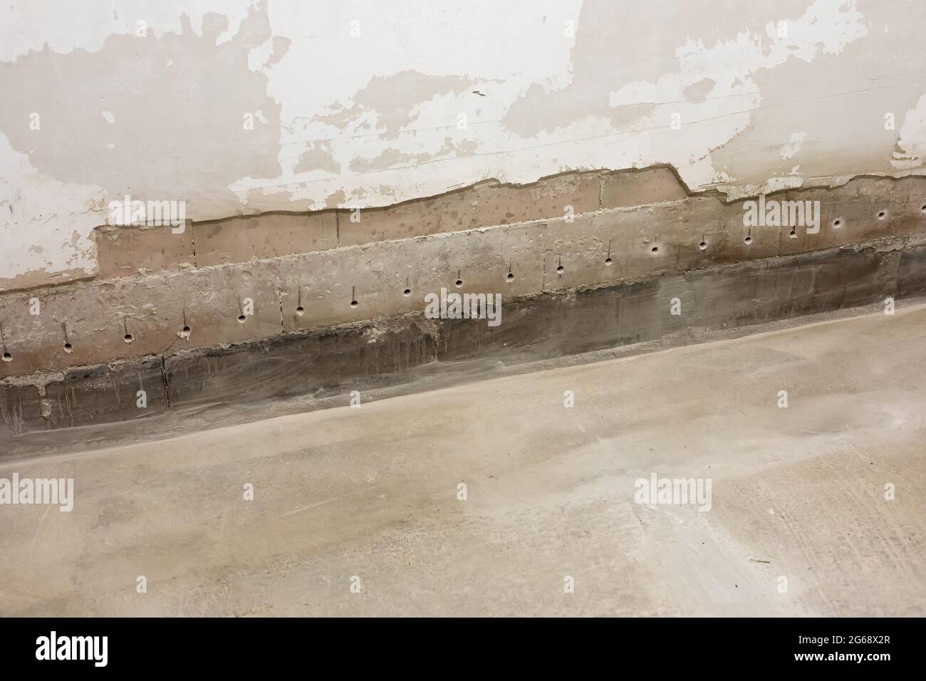 damp wall in the basement of a new building Stock Photo - Alamy