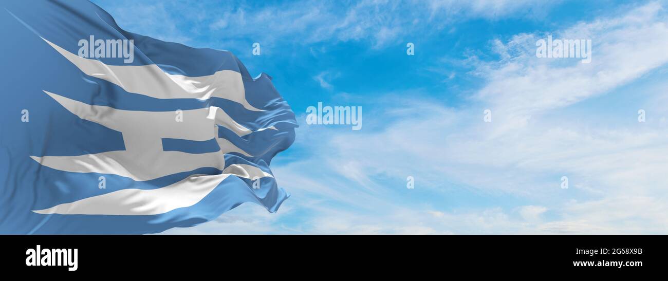 official flag of Hyogo prefecture waving in the wind on flagpoles ...