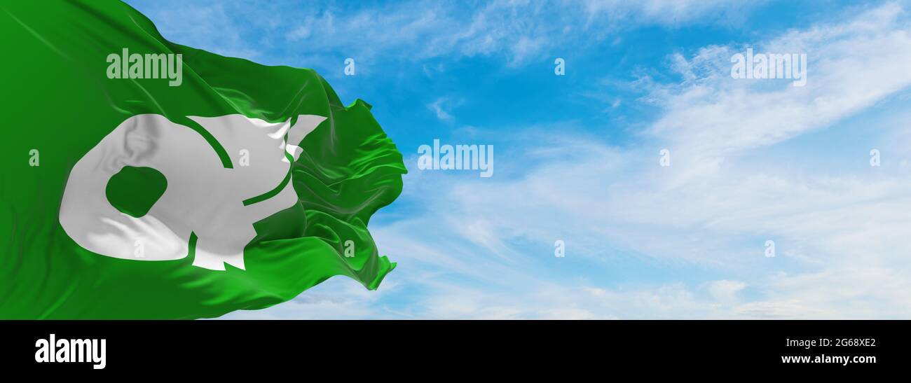 official flag of Mie prefecture waving in the wind on flagpoles against ...