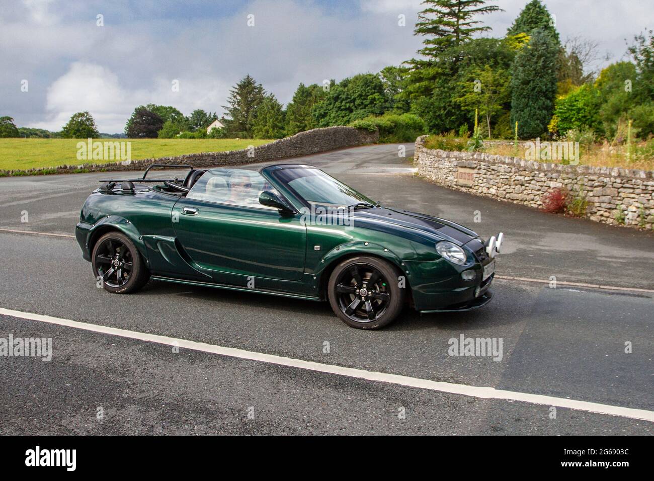 MG TF rear wheel drive roadster car en-route to Leighton Hall classic ...