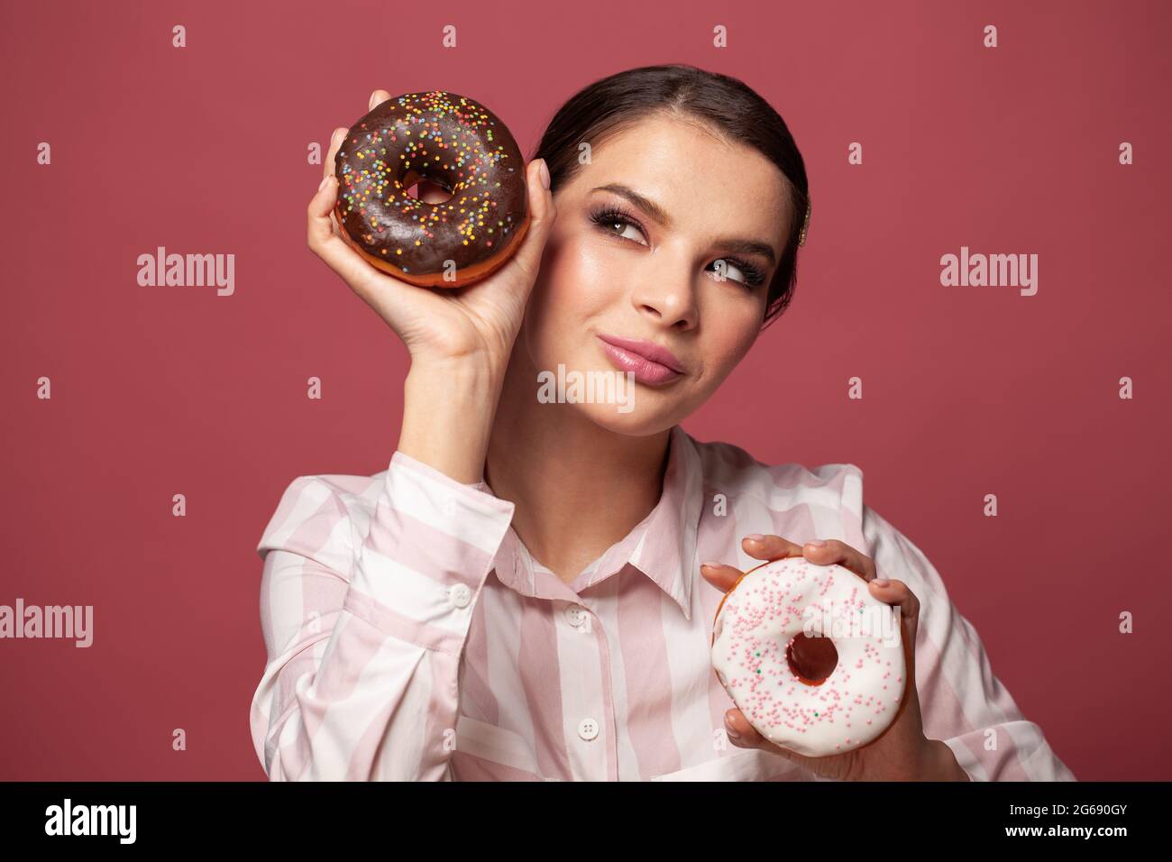 Funny young woman eating donut hi-res stock photography and images - Alamy