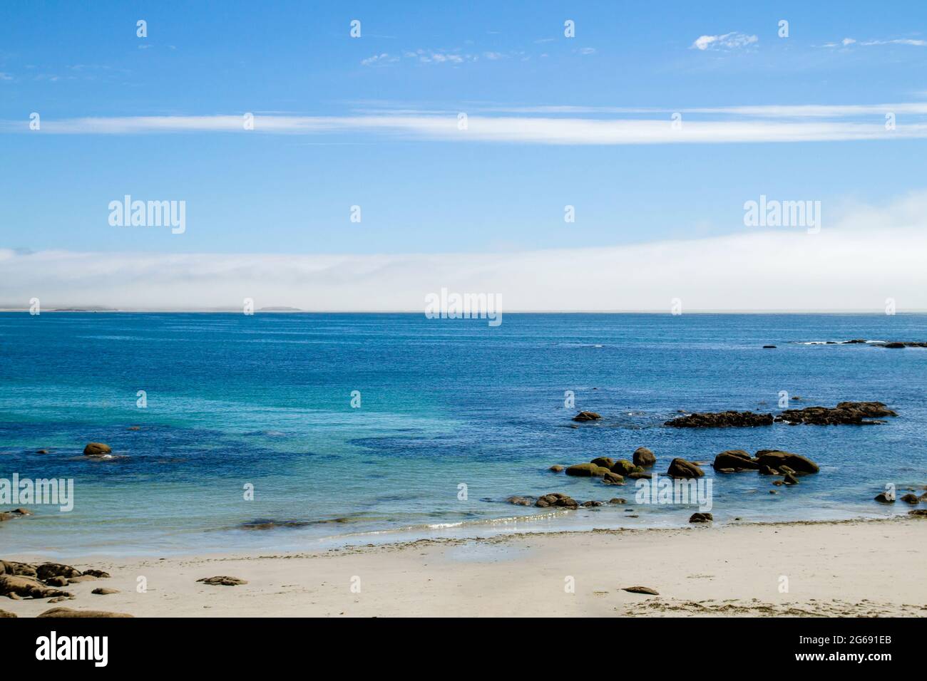 Sandy beach with rocks in Galicia, Spain Stock Photo - Alamy
