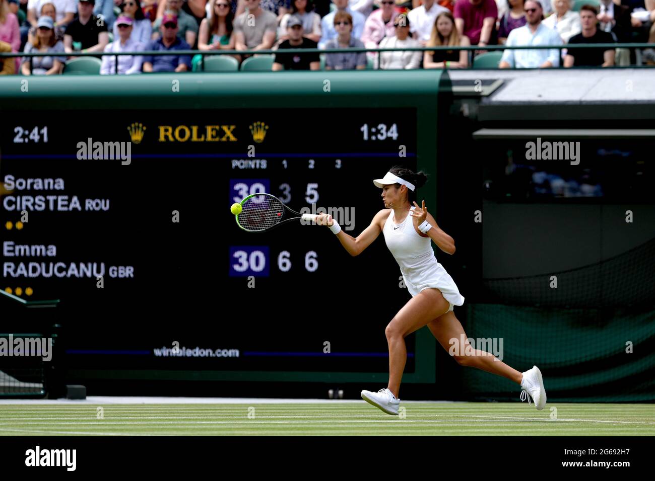Emma Raducanu in action late in the match before defeating Sorana ...