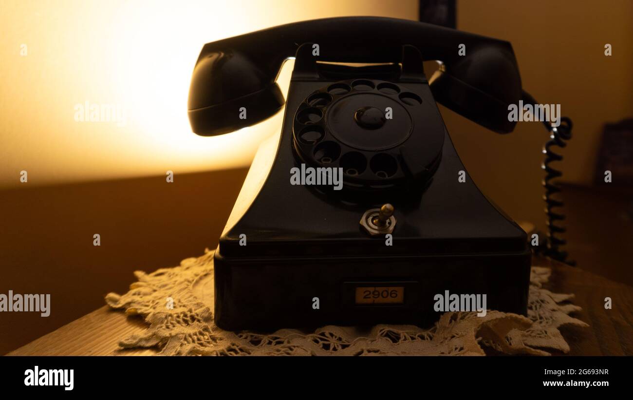 old black plastic phone with a wheel to dial the numbers Stock Photo ...