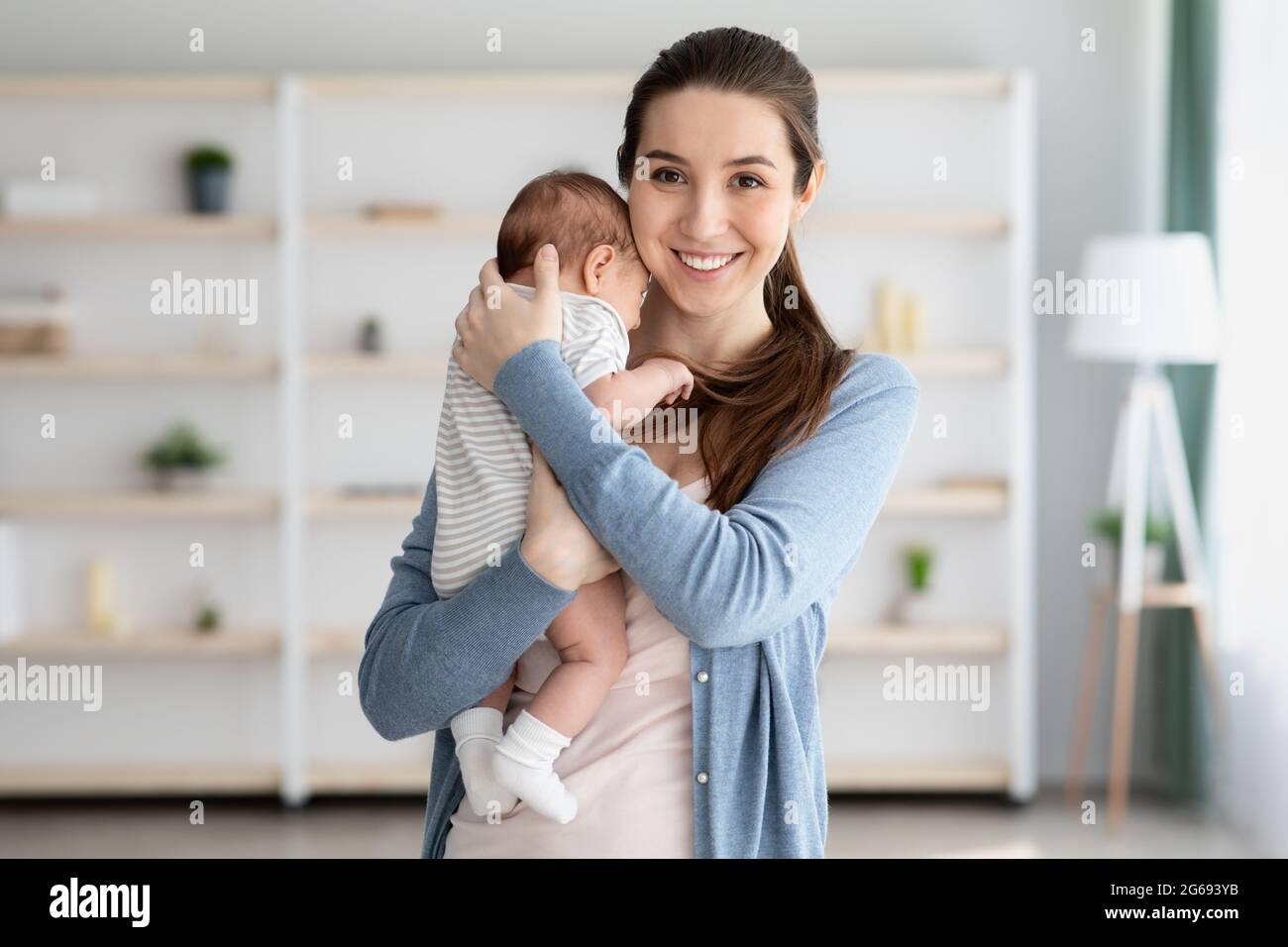 Happy Maternity Time. Portrait Of Beautiful Young Mother Embracing Her ...