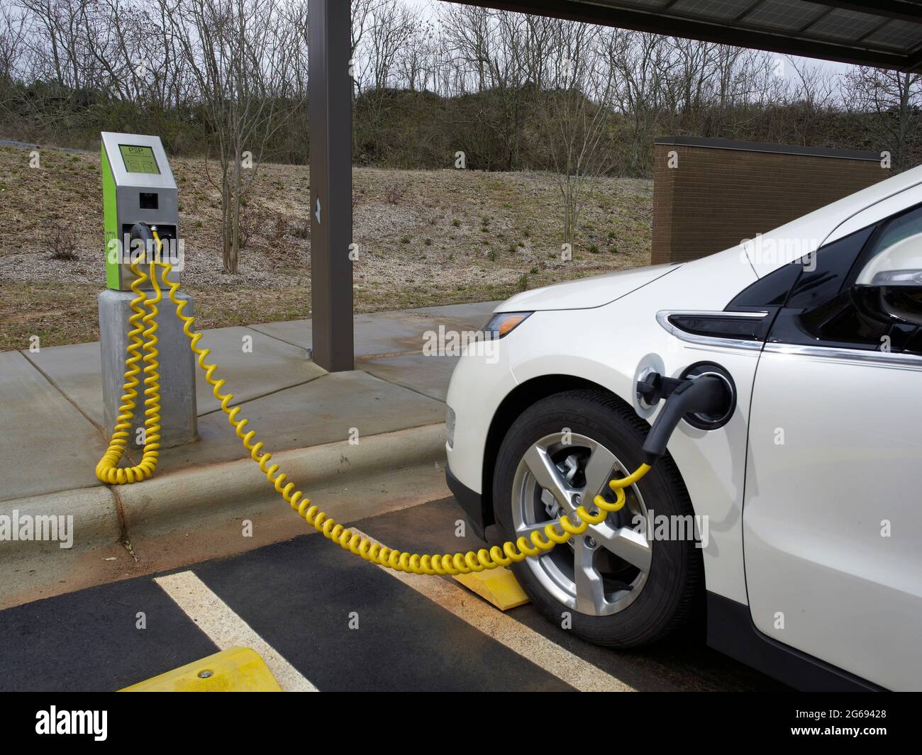 Electric vehicle recharging Stock Photo - Alamy