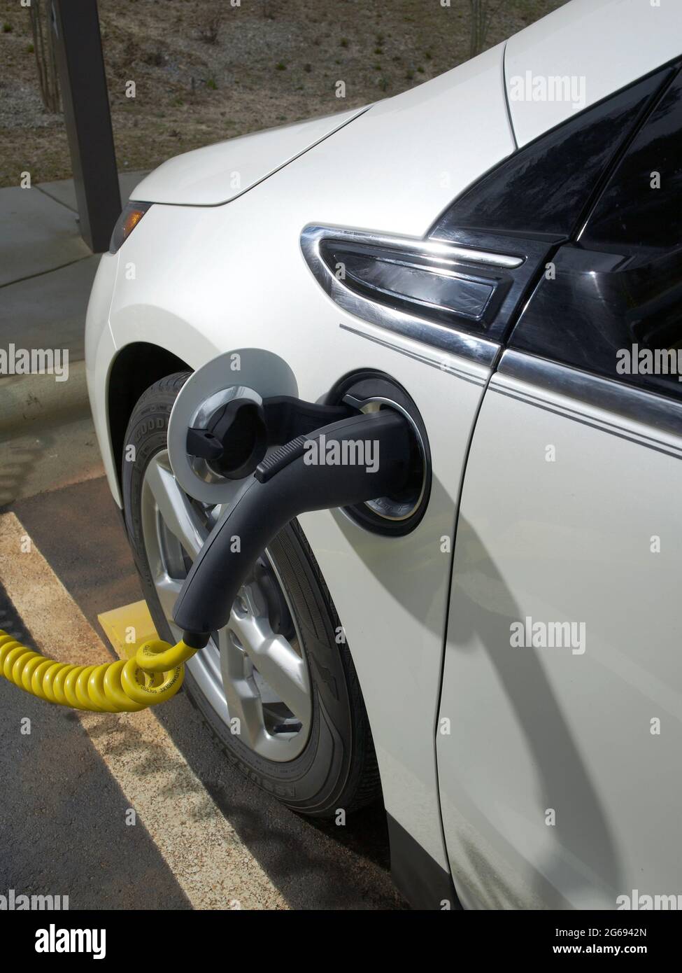 Electric vehicle recharging Stock Photo - Alamy