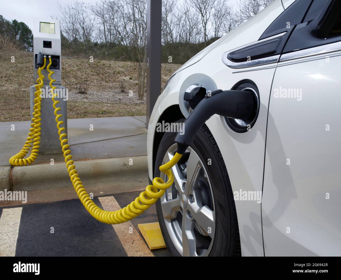 Electric vehicle recharging Stock Photo - Alamy