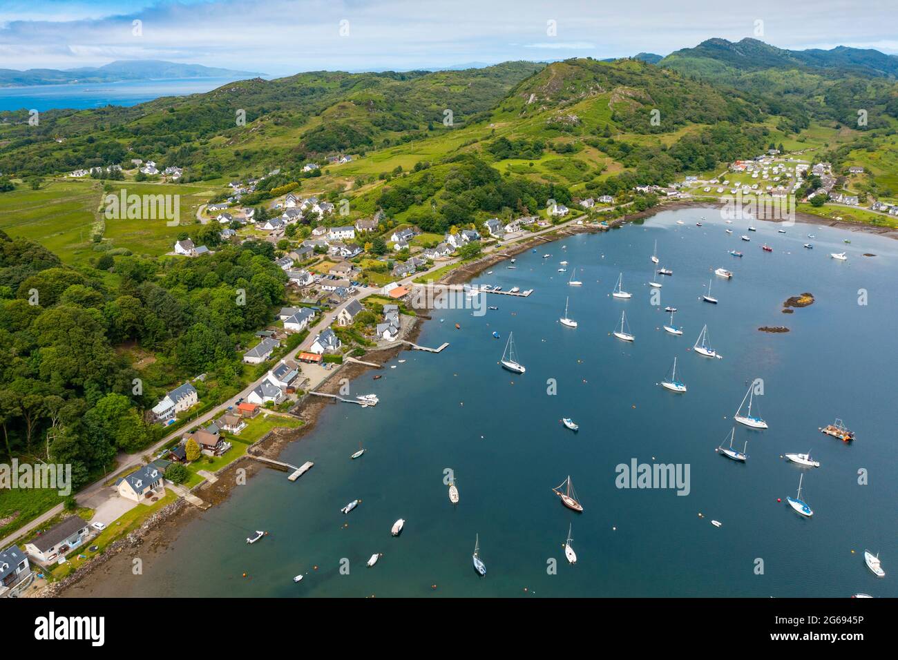 Aerial view from drone of village and harbour at Tayvallich on Loch ...