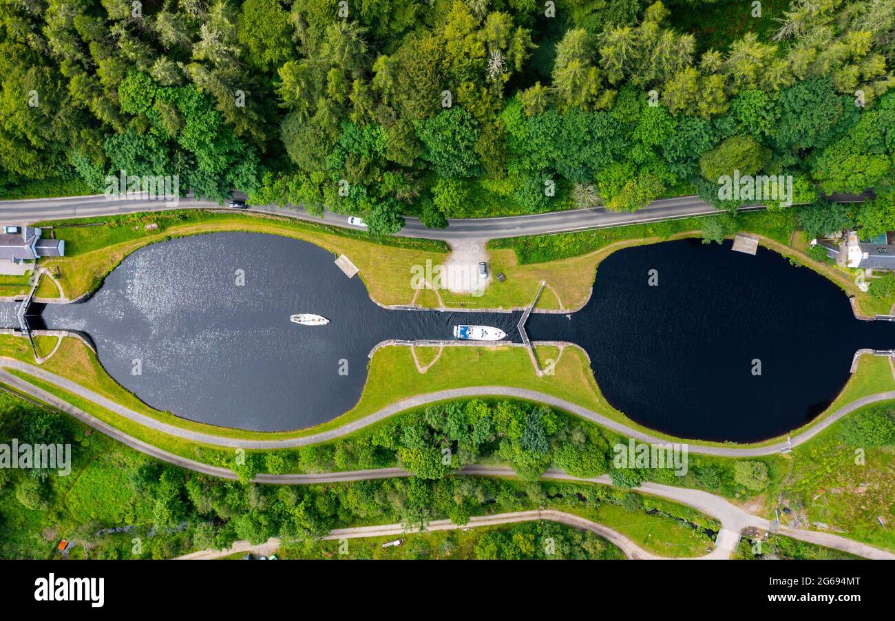 Aerial view from drone of flight of locks on the Crinan Canal in Argyll ...