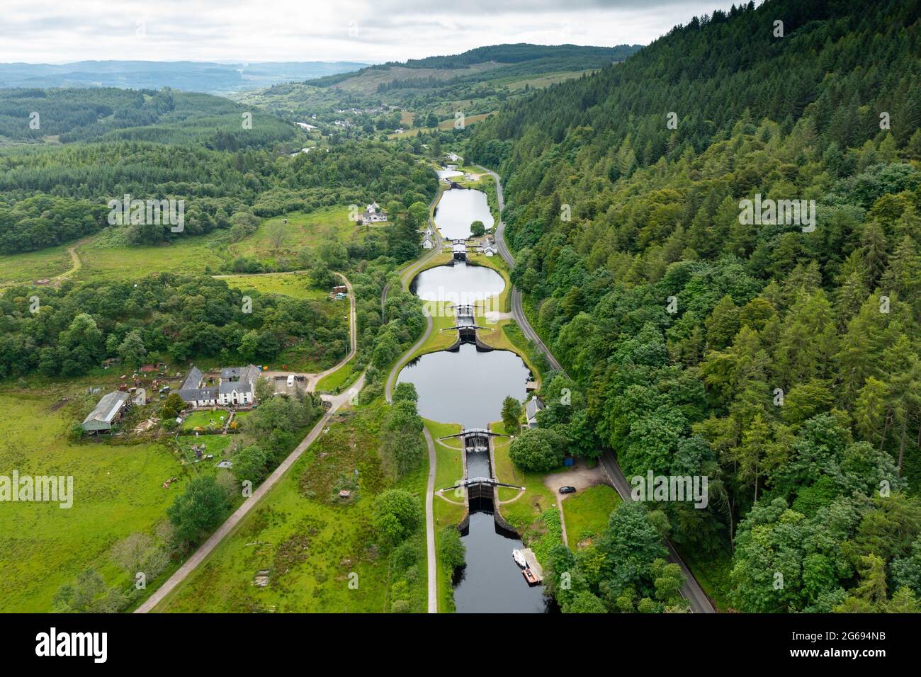 Aerial view from drone of flight of locks on the Crinan Canal in Argyll ...
