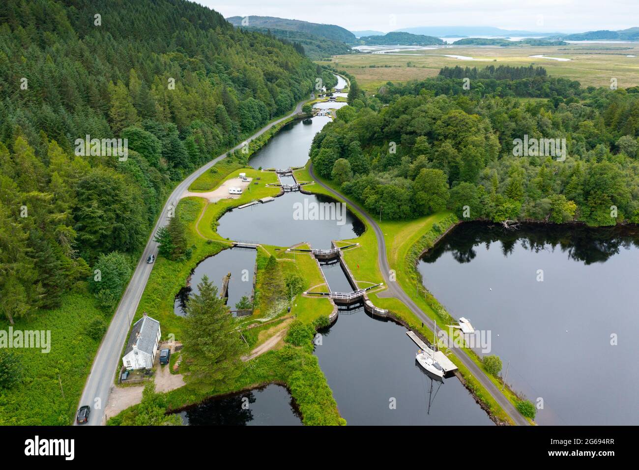 Aerial view from drone of flight of locks on the Crinan Canal in Argyll ...