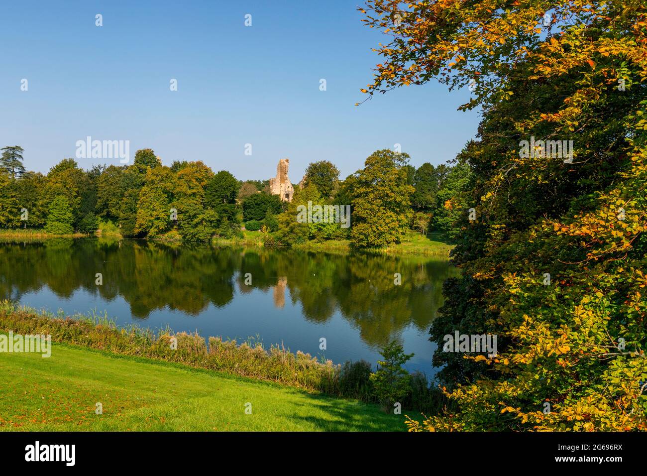 The view across the ornamental lake created by Capability Brown towards ...