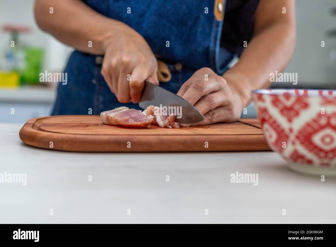 Cook woman meat hi-res stock photography and images - Alamy