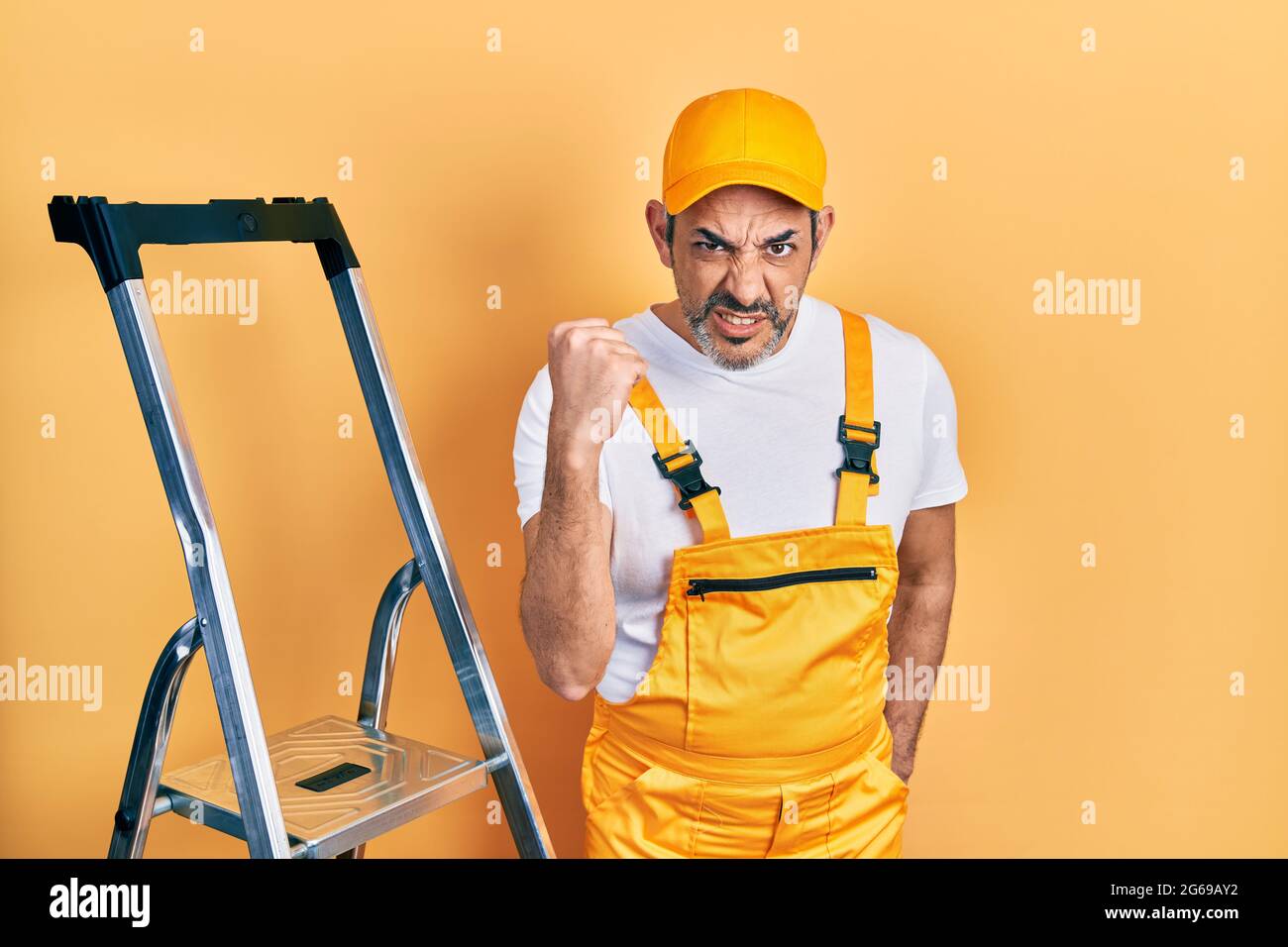 Construction worker raising fist hi-res stock photography and images ...
