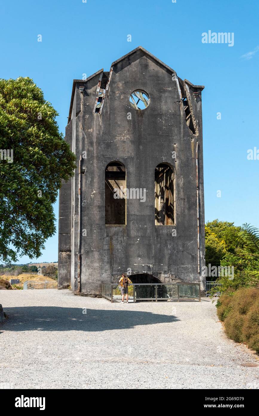 Old tall industrial building at Waihi gold mine in New Zealand Stock ...