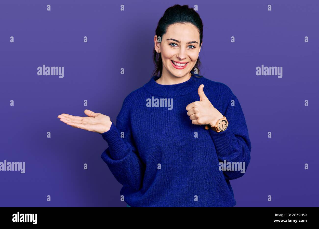 Young hispanic woman wearing casual clothes showing palm hand and doing ...