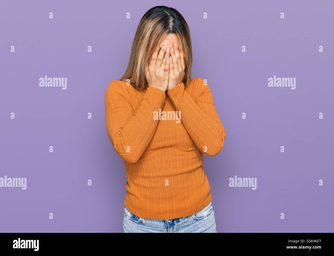 Young caucasian woman wearing casual clothes with sad expression ...