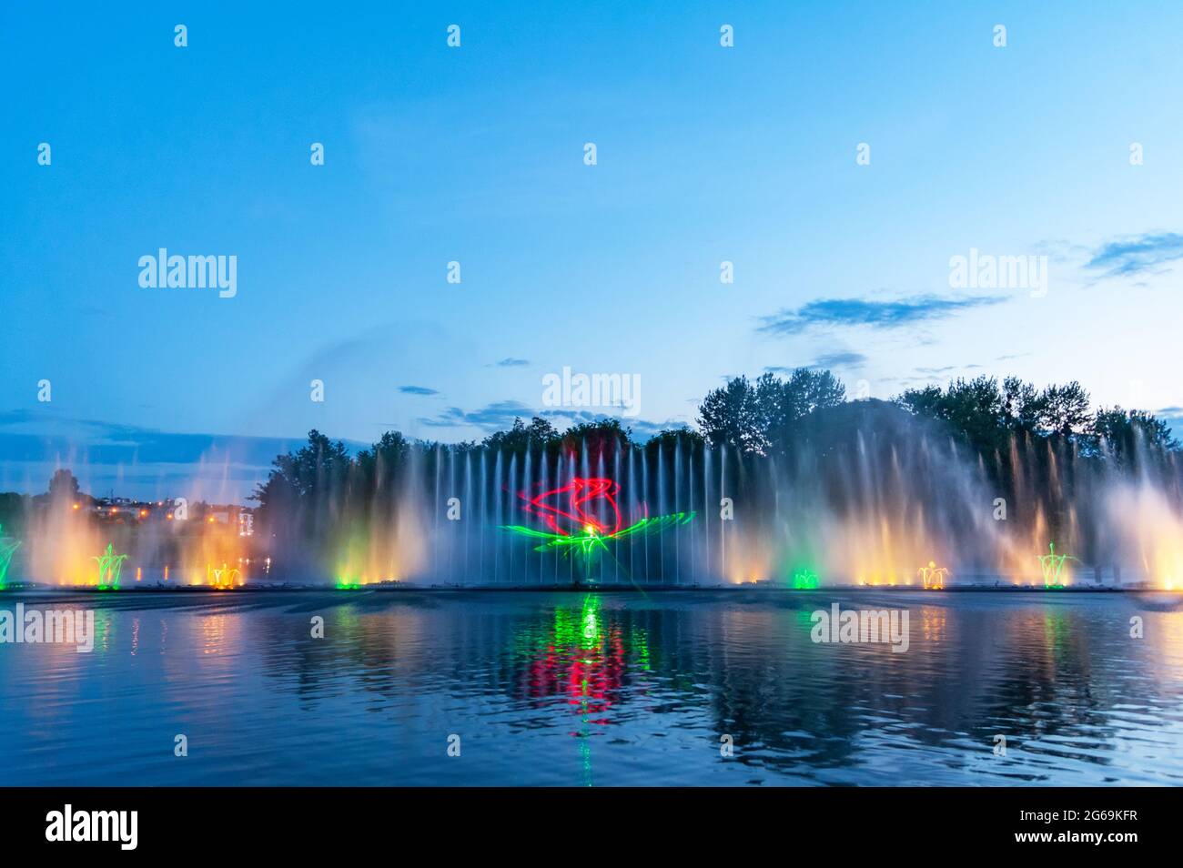 Musical fountain with laser animations. Night laser fountain show, on ...