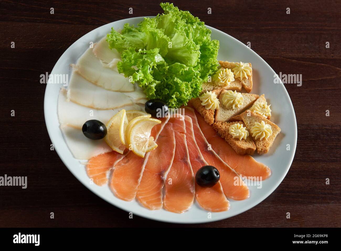 Smoked salmon served at the restaurant Stock Photo - Alamy
