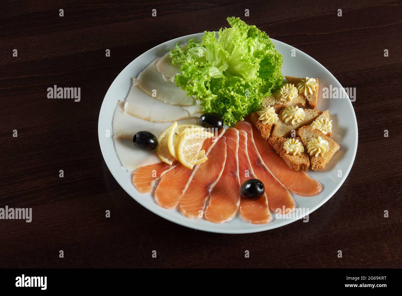 Smoked salmon served at the restaurant Stock Photo - Alamy