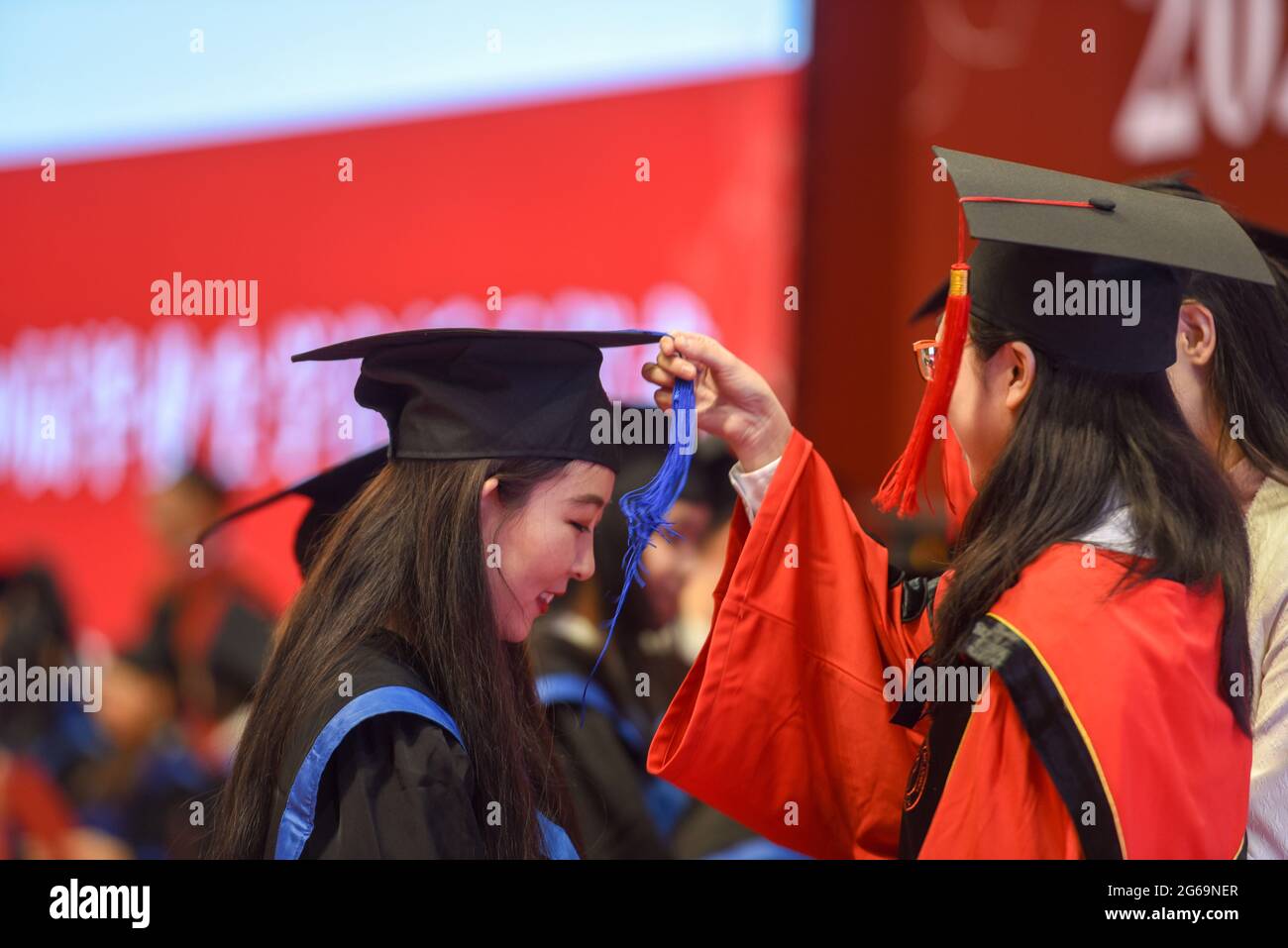 University graduates attend graduation ceremony hi-res stock ...