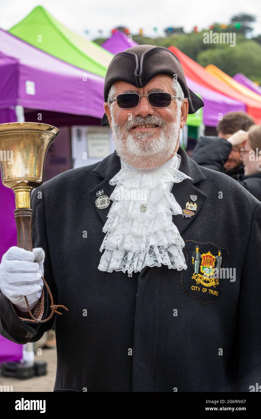Truro, UK,4th July 2021,The town crier, Lionel Knight, attends the ...